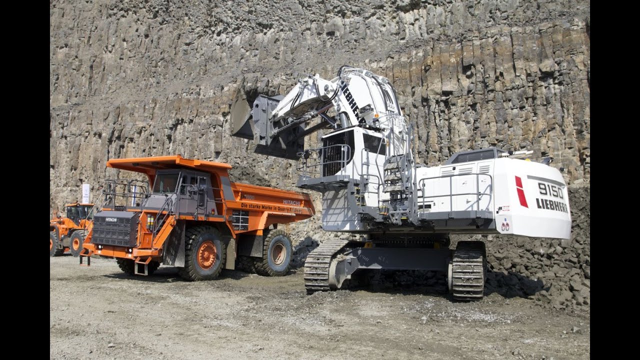 Liebherr R 9150 Hochlöffel Mining Bagger belädt Hitachi EH 1100 - 5 I ...