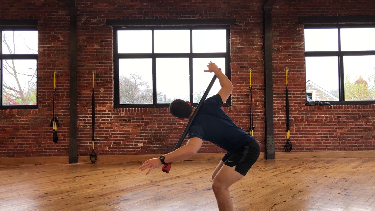 Standing Thoracic Rotation (with dowel) - YouTube