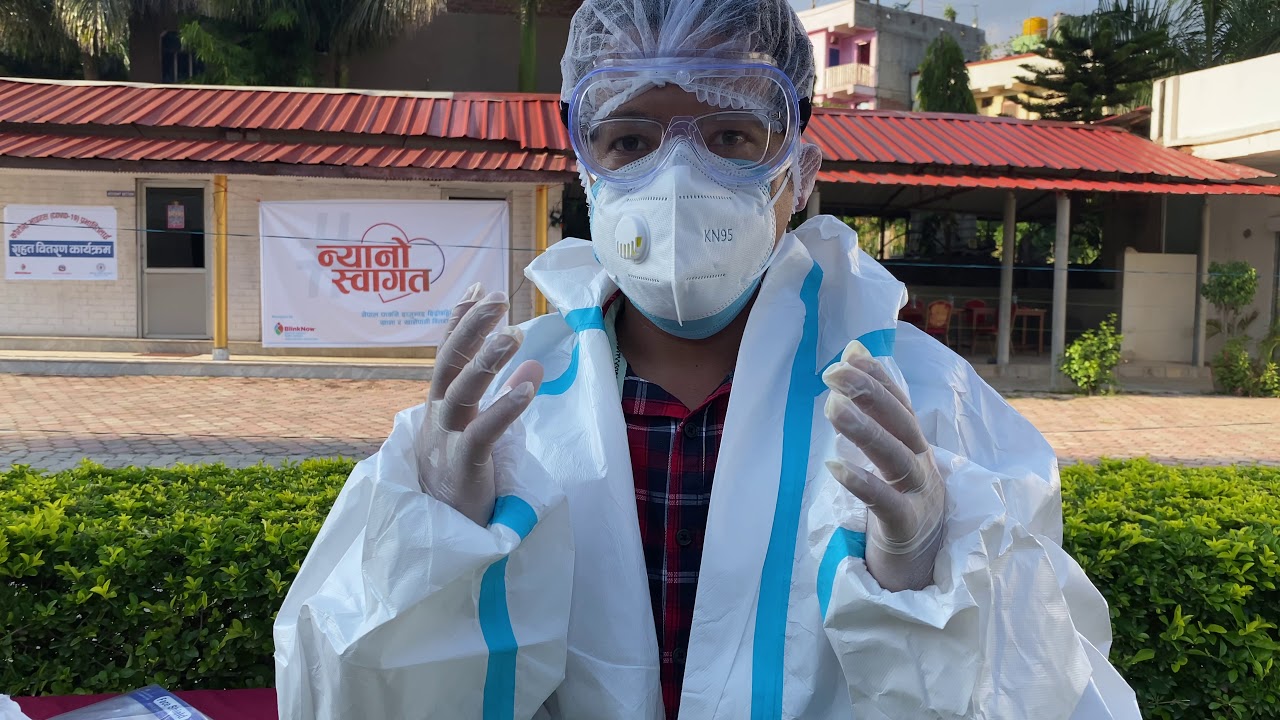 Dr. Prakash Oli teaches safe PPE practices in Nepali - YouTube