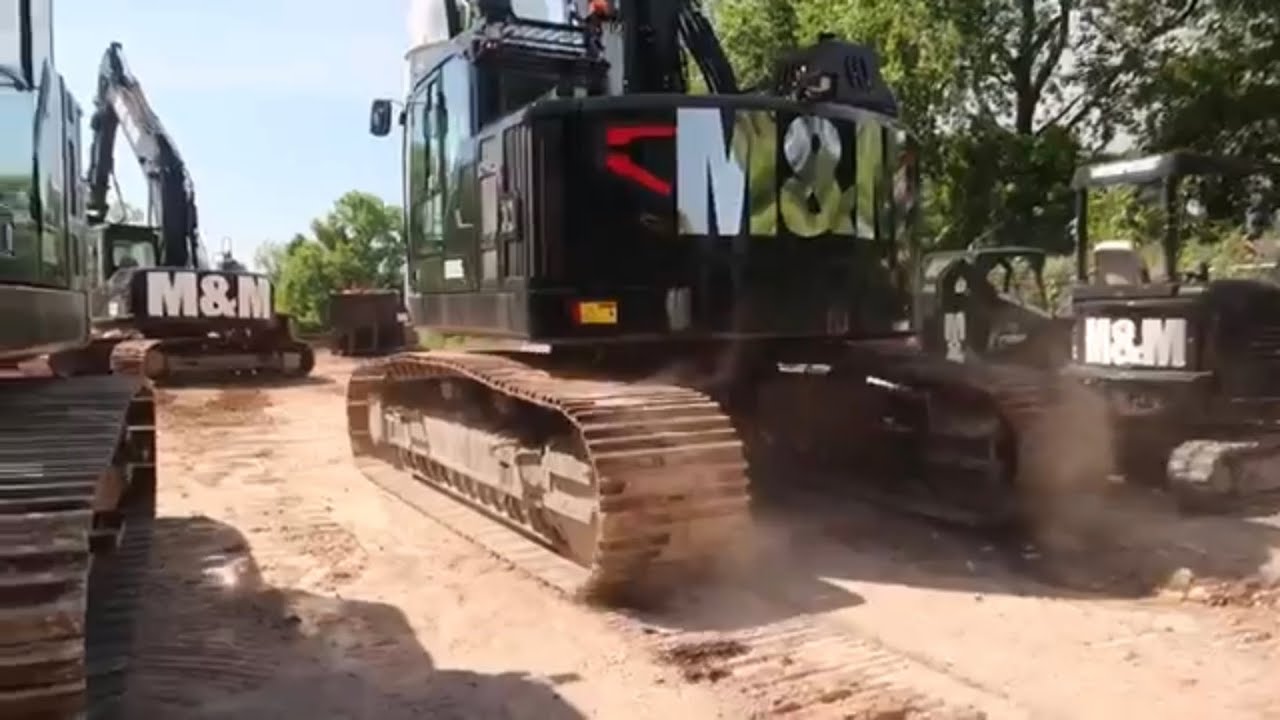 New Volvo 355 & AMI Graptor bucket digging concrete footings - YouTube