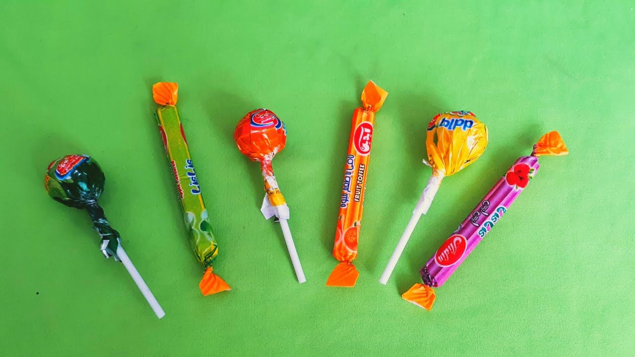 The soothing sound of unboxing lollipops and colored chocolates#candy # ...