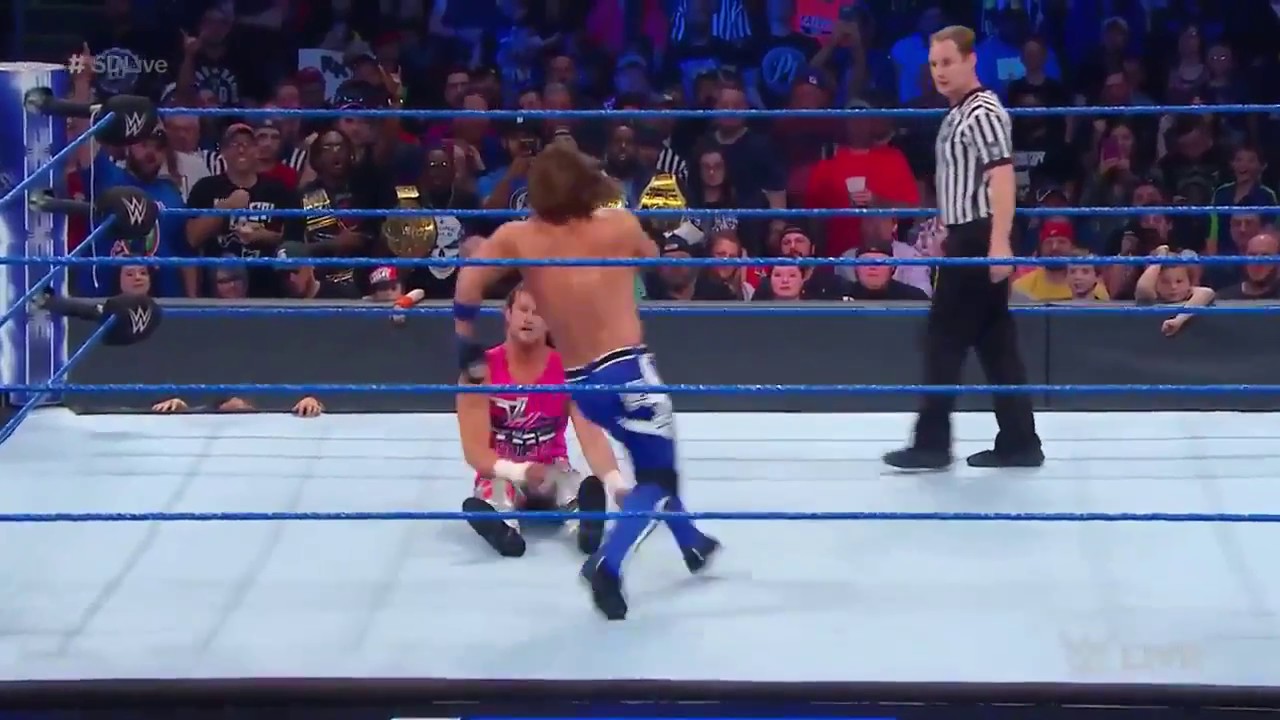 AJ Styles - Sliding forearm smash - YouTube