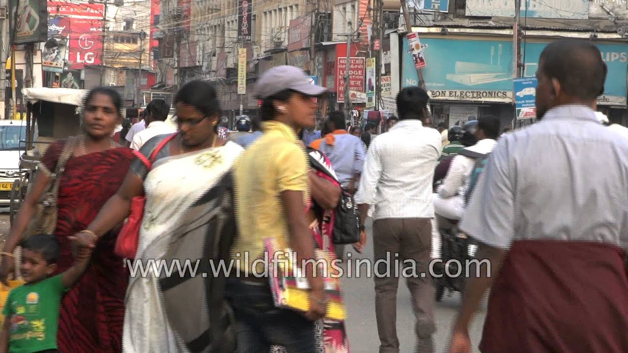 Streets of a typical Indian city: coexistence of people and vehicles ...