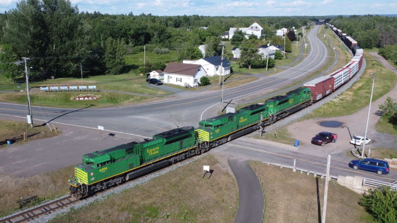 Awesome Aerial 4K View! Big Freight Train NBSR 121 Passing thru Tracy ...