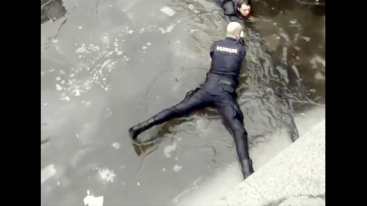 Policeman, water and ice - YouTube