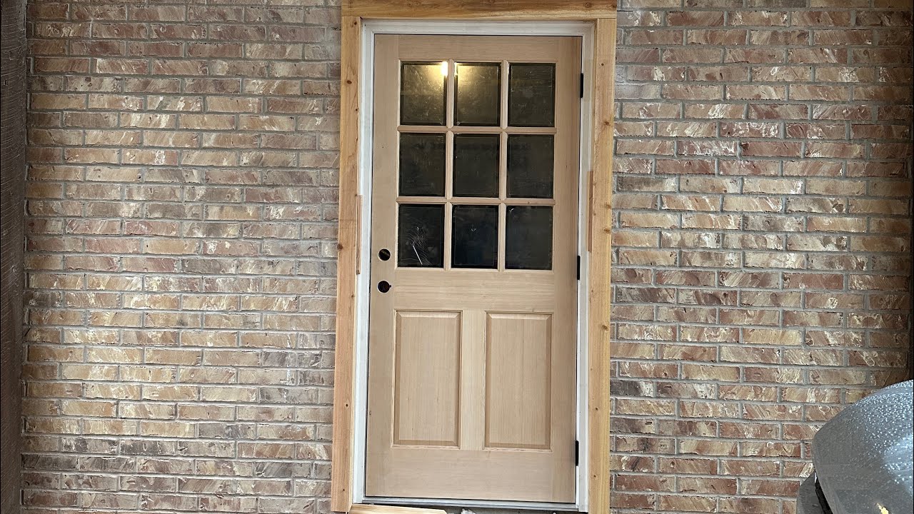 Door install into brick wall - YouTube