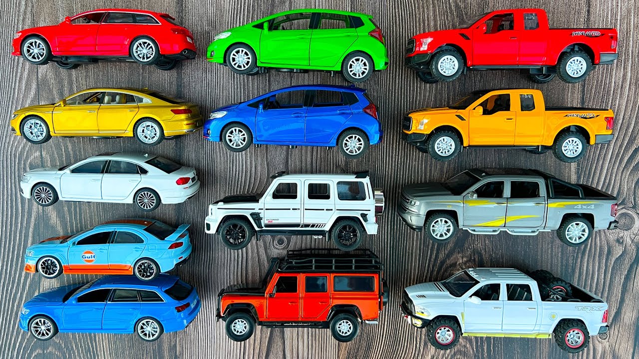 SUVs, Sports Cars and Other Diecast Shown in Hands Mix of Diecast SUVs ...