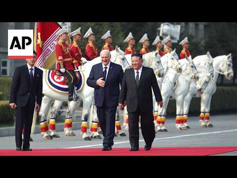 Kim Jong Un greets Belarus' Lukashenko as he arrives in North Korea