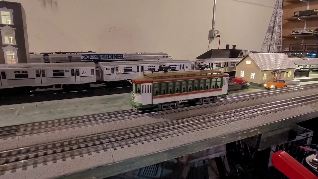 MTH Christmas Brill Trolley In Action - YouTube