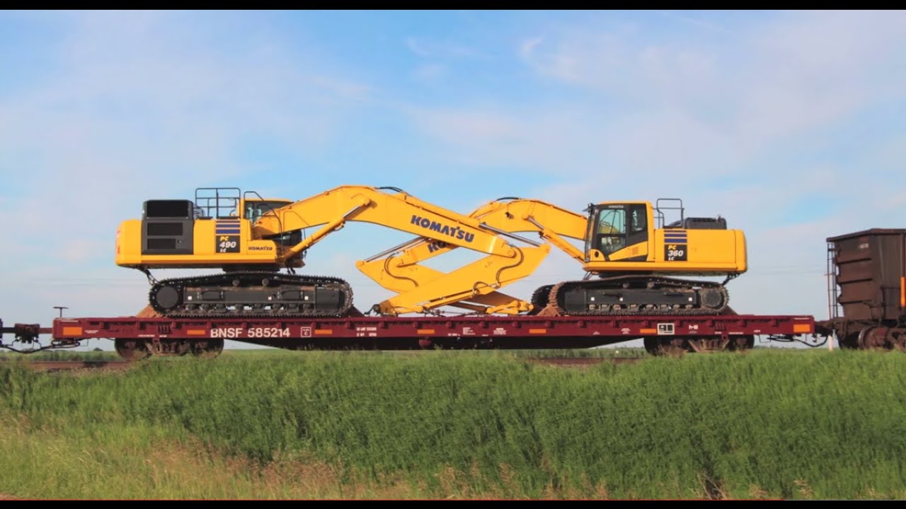 CN Manifest Train With Excavator Loads - YouTube