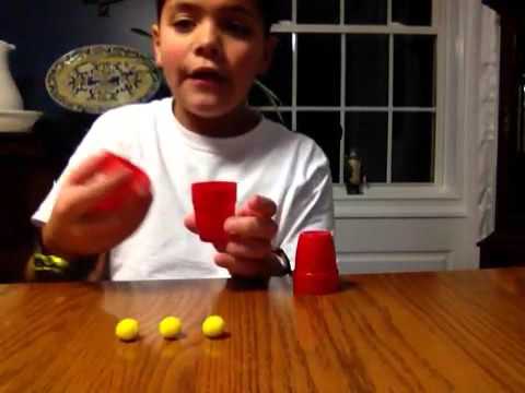 Magic cup and ball trick - YouTube