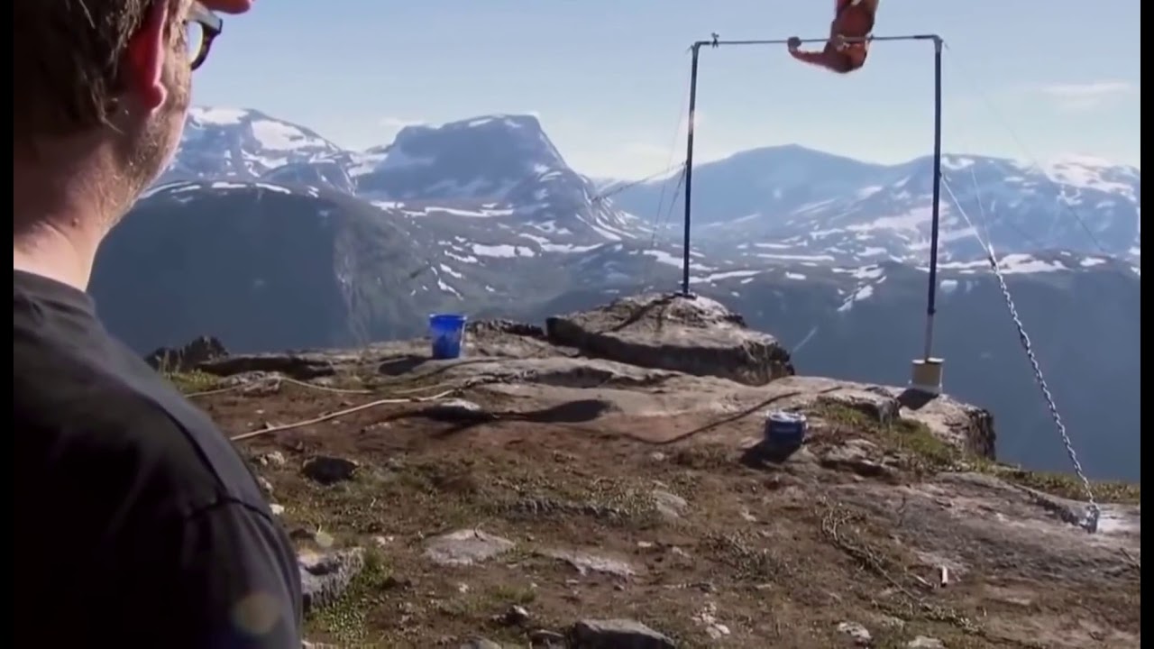 Man falls off cliff while swinging on a pole!!!! - YouTube