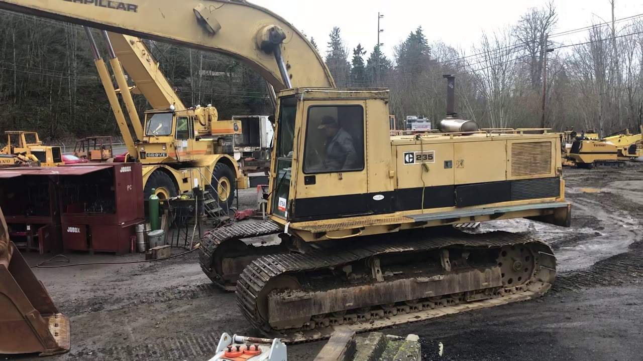 Cat 235 excavator - YouTube