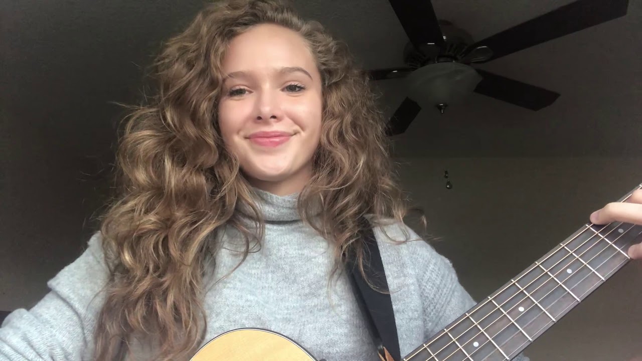 Starling singing and playing “Wichita Lineman” and “Blue” on acoustic ...