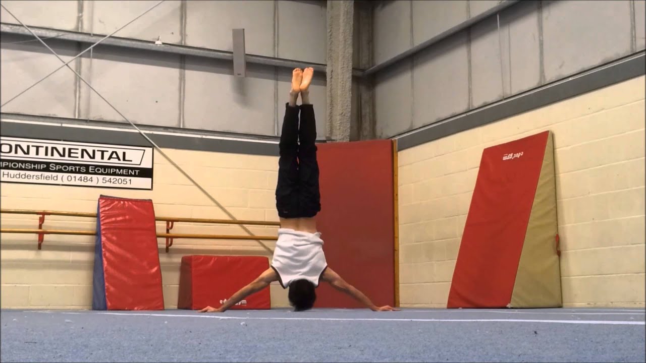 Backward Roll to Japanese Handstand - YouTube