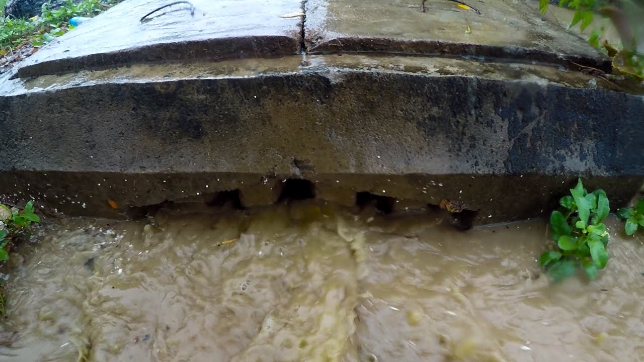 Unclogging Culvert Drain - Remove Trash And Debris Clogged Drain - YouTube