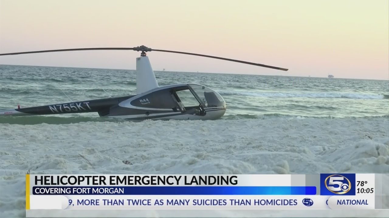 Helicopter makes emergency landing off Fort Morgan - YouTube