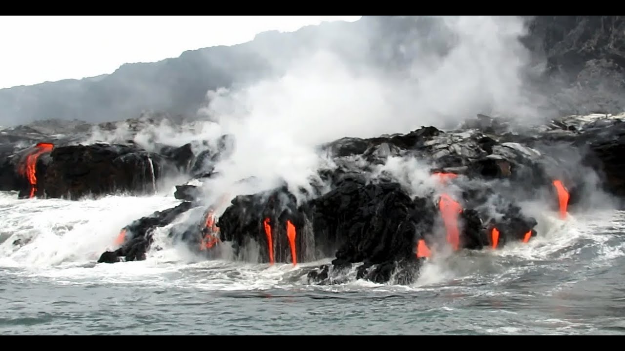 Lava meets the ocean, filmed from a boat on August 28, 2016. (The Big ...