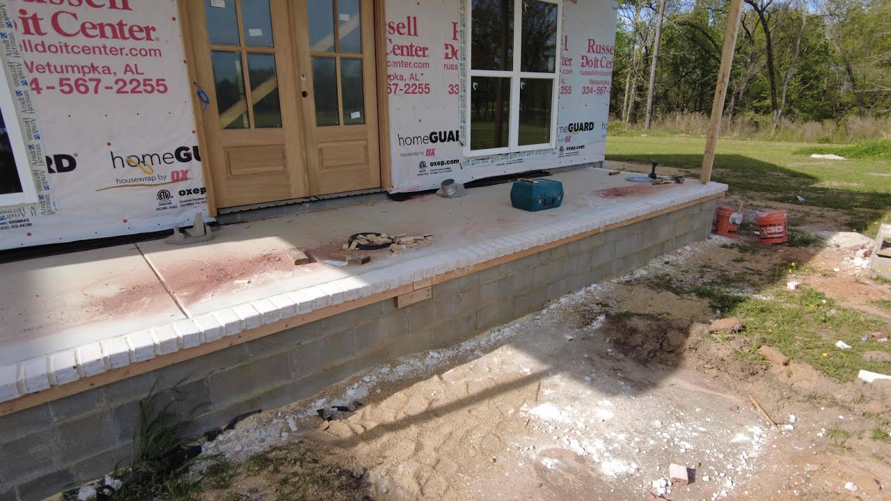 Farmhouse Build Day 156 - Brick Ledge on Porch and Baseboards - YouTube