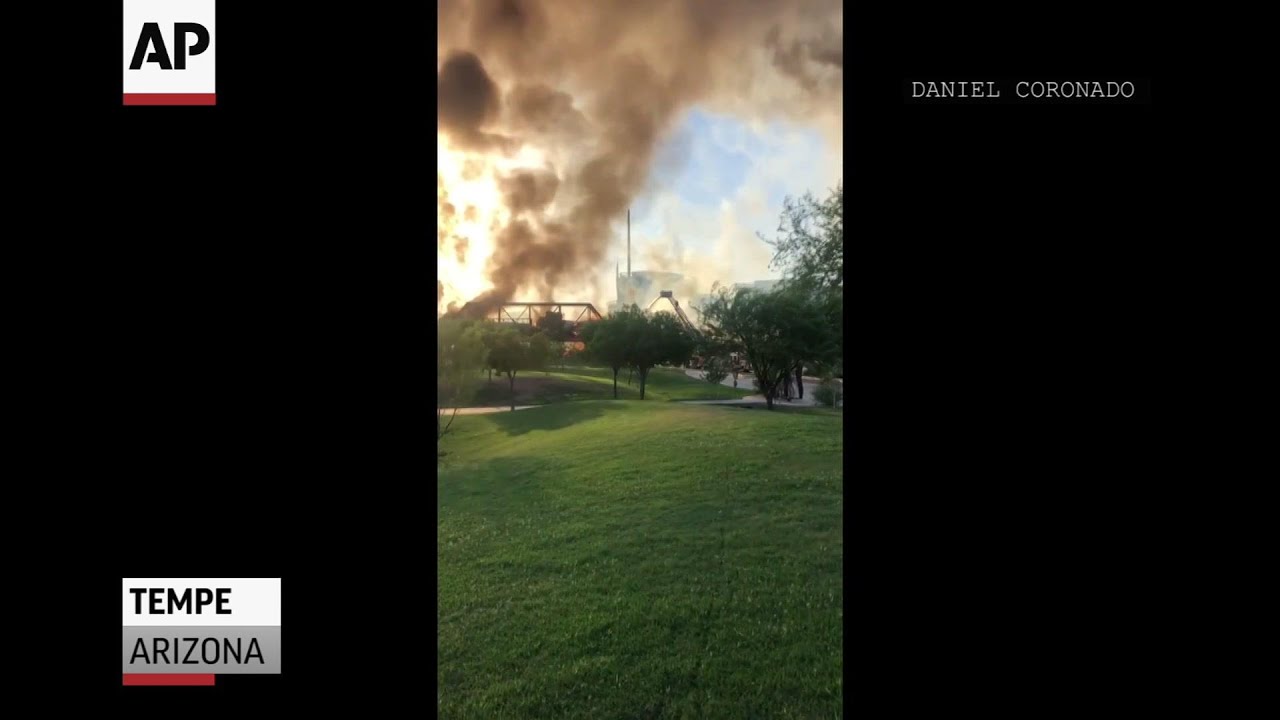 Train derails on Arizona bridge that collapses, catches fire