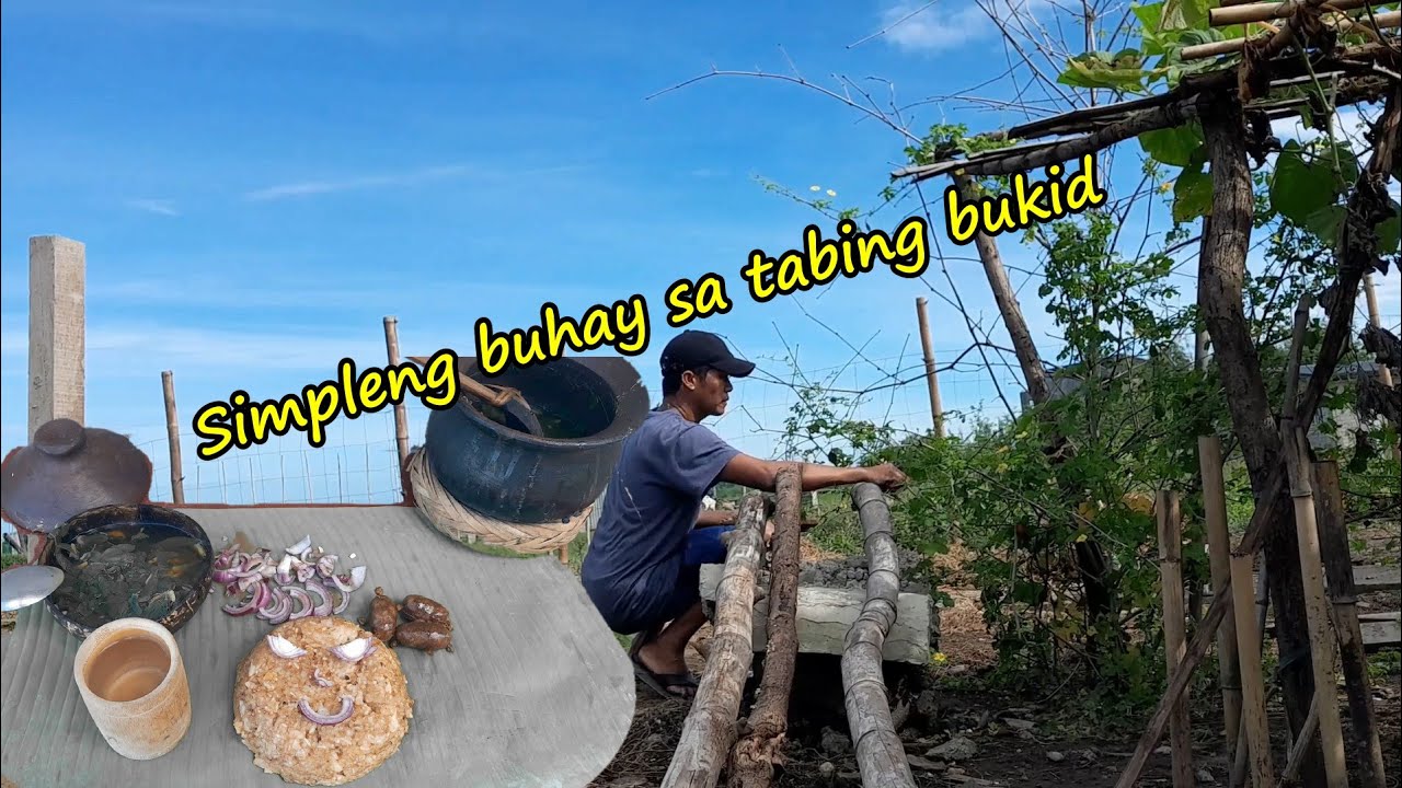 Traditional cooking of inabraw with a side dish longganisa of Vigan ...