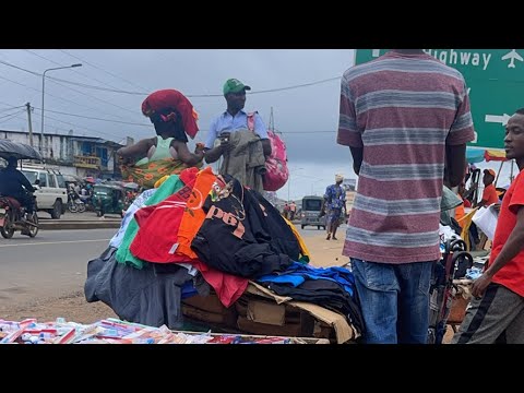 Life in Liberia biggest street market red light market - YouTube