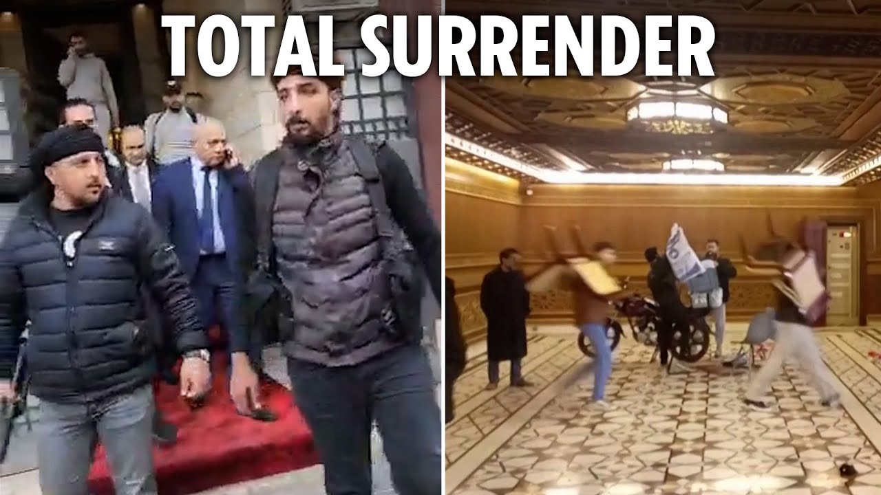 Syrian PM is frogmarched from home by armed rebels to hand over power ...