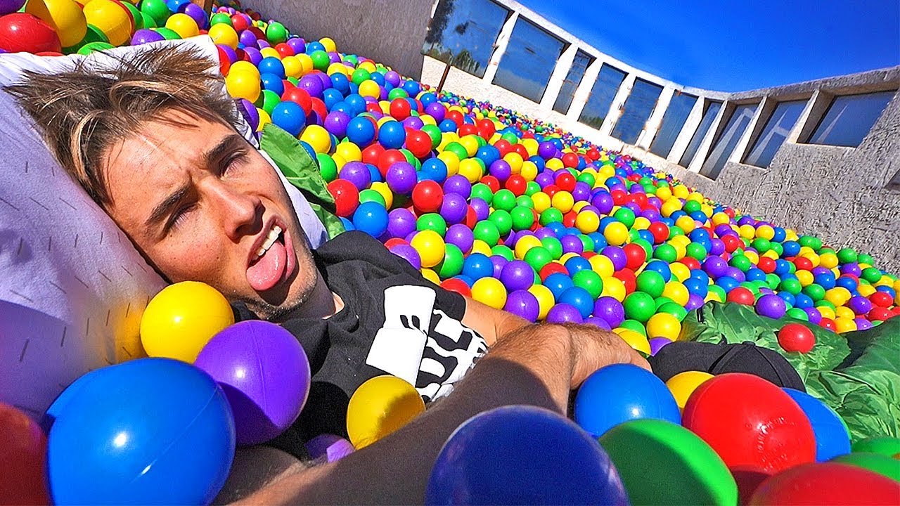 24 HOUR CHALLENGE IN OUR ROOFTOP BALL PIT! (100,000 BALLS) - YouTube