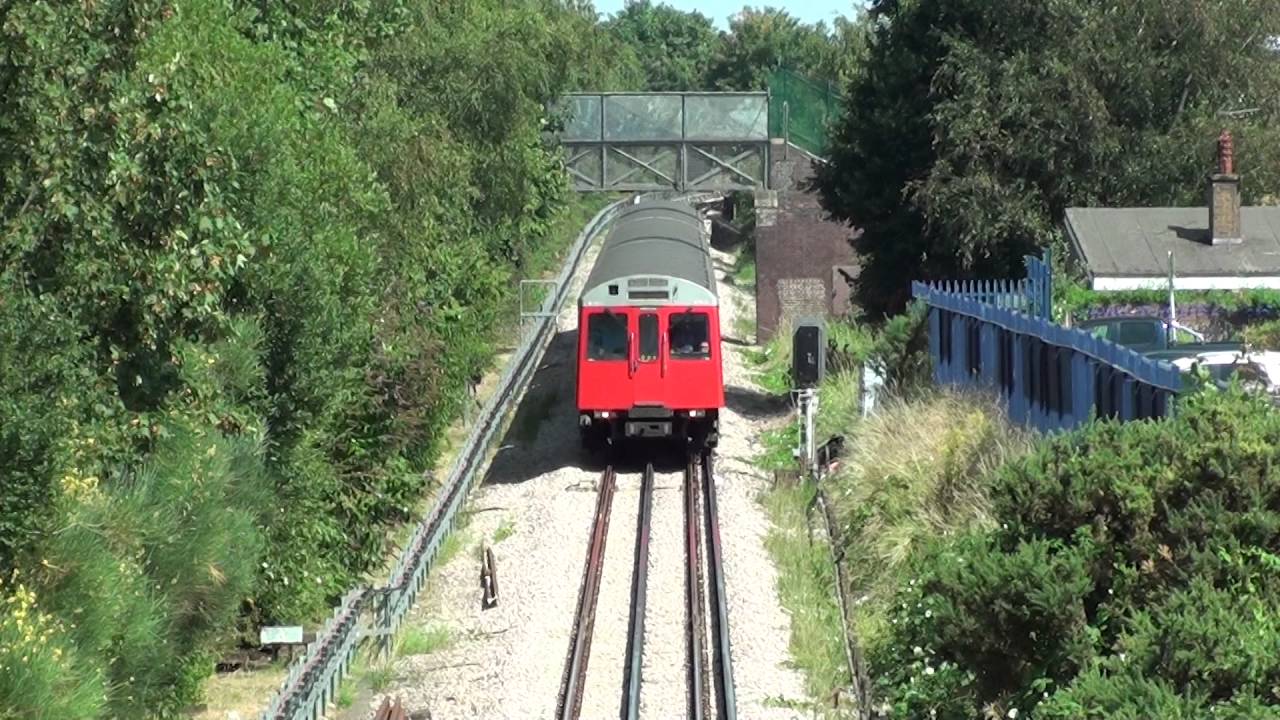 (HD) Westbound District & Piccadilly Line trains at Chiswick Park - YouTube