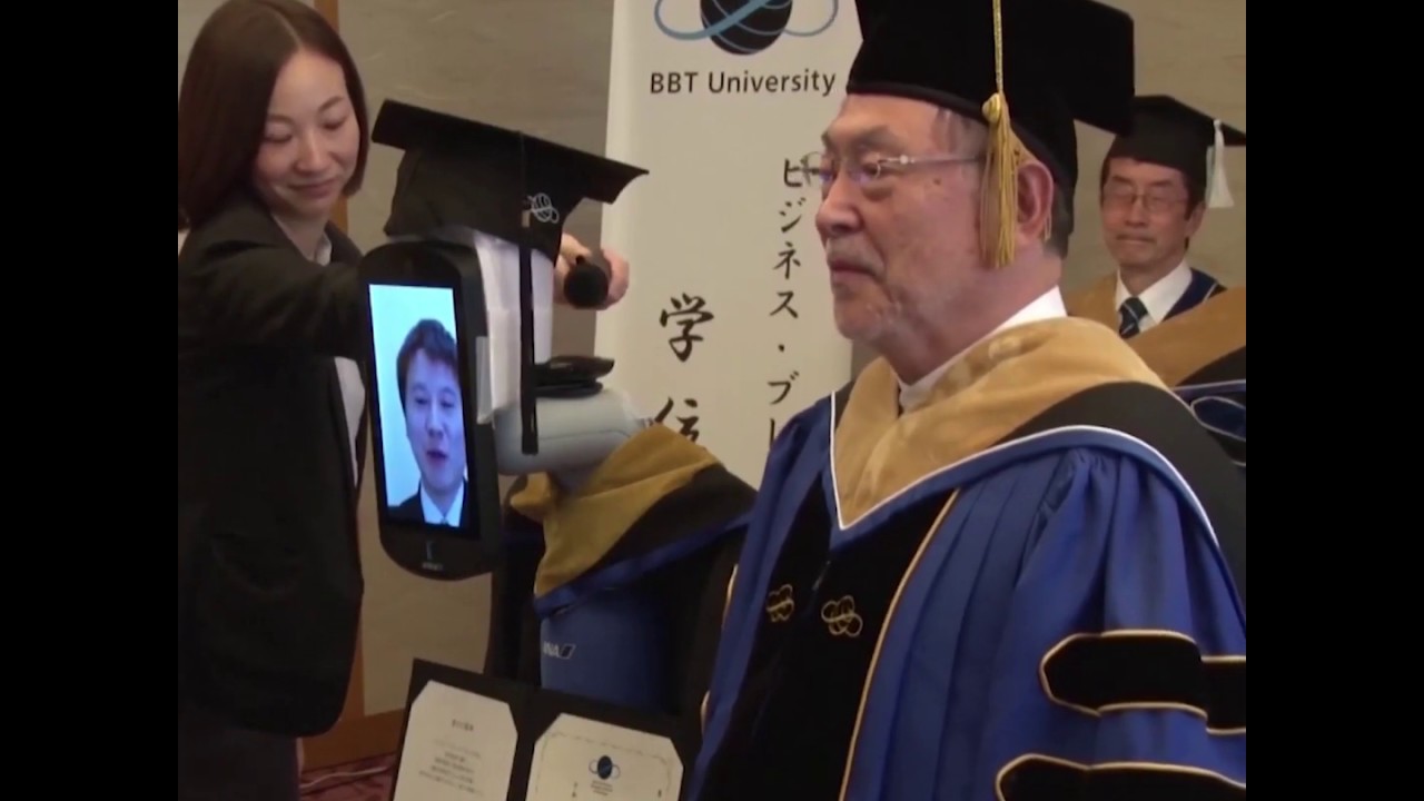 University in Japan holds graduation ceremony using avatar robots - YouTube