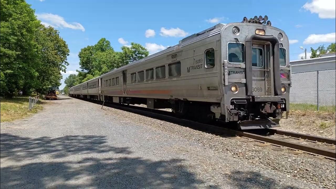 NJT 4623 doing crossing protect in downtown Hammonton. 6069/4204 - YouTube
