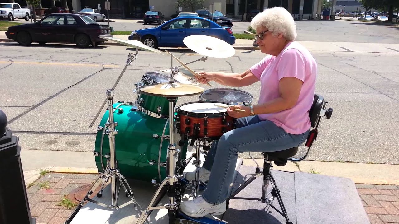 Grandma Drummer Tearing it up in Downtown La Crosse - YouTube
