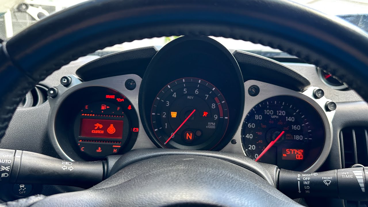 Replacing the crack gauge cluster on my 370z - YouTube
