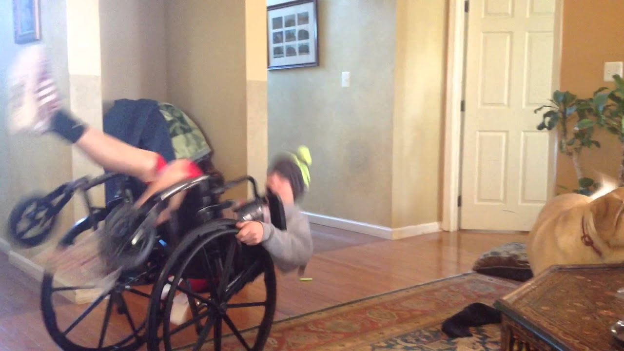 Kid tries to do a wheelie on a wheelchair - YouTube