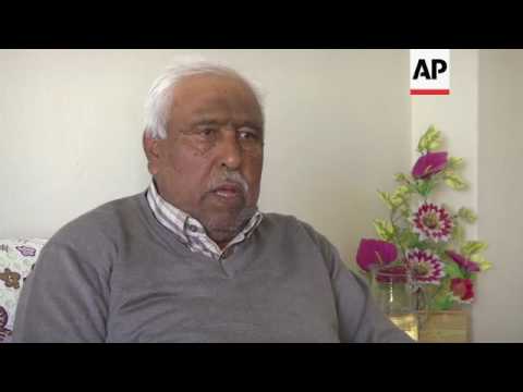 Neighbours of man who killed Russian envoy speak