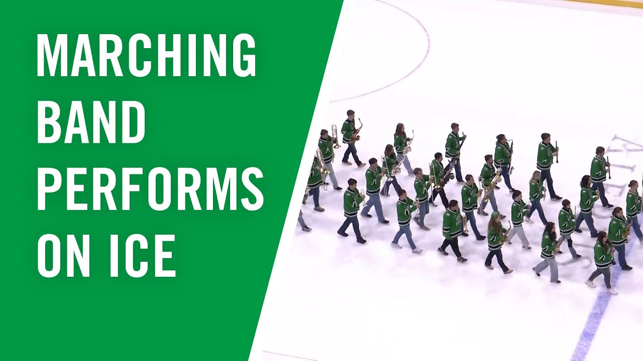 Marching Band on Ice! UND Pride of the North at The Ralph 🏒 - YouTube