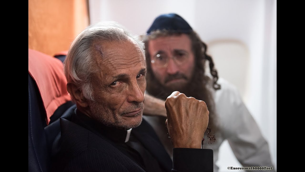 Actor Robert Miano (Father Romero) behind-the-scenes on the set of ...