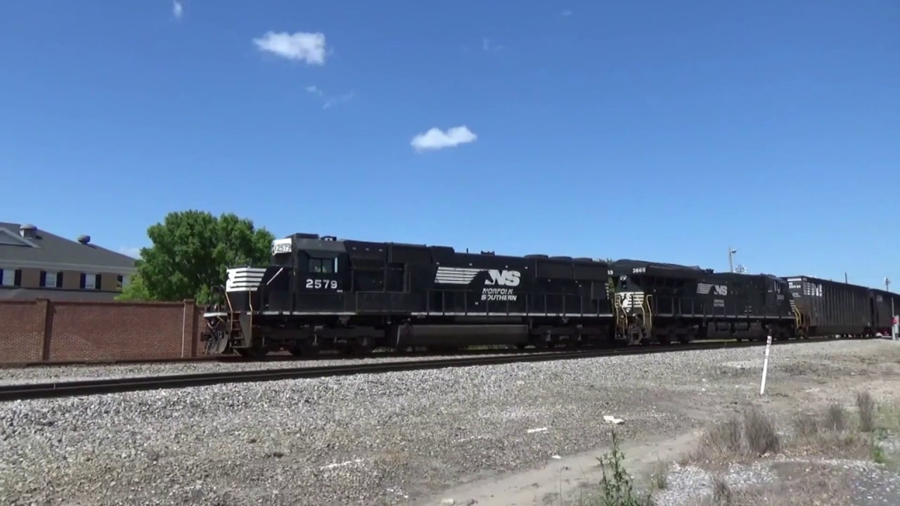 NS P65 (CSX Z368-06) empty woodchip train heads through Devine junction ...