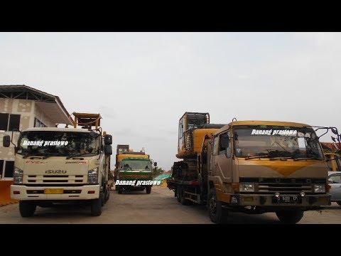 Isuzu | Fuso Self Loader Truck Loads Transport Excavators and Motor ...