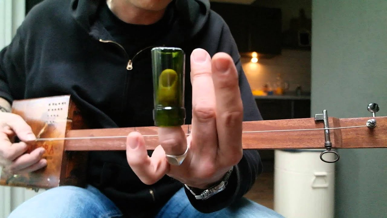 1 string Diddley Bow lesson: Het klassieke bluesthema op 1 snaar - YouTube