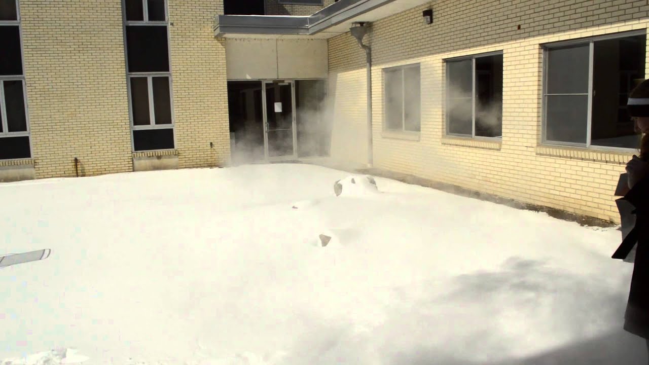 Boiling Water Freezing in Mid Air Slow Motion - YouTube