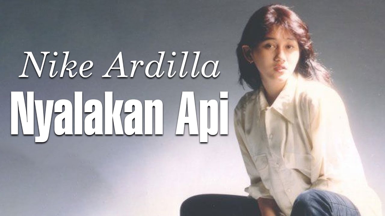 Nike Ardilla - Nyalakan Api [ LIRIK} - YouTube