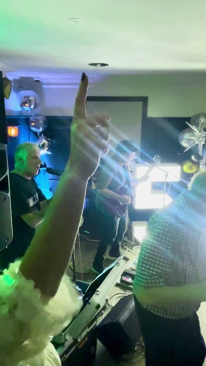 RockEnergy perform Bon Jovi's Livin On A Prayer at a private function ...