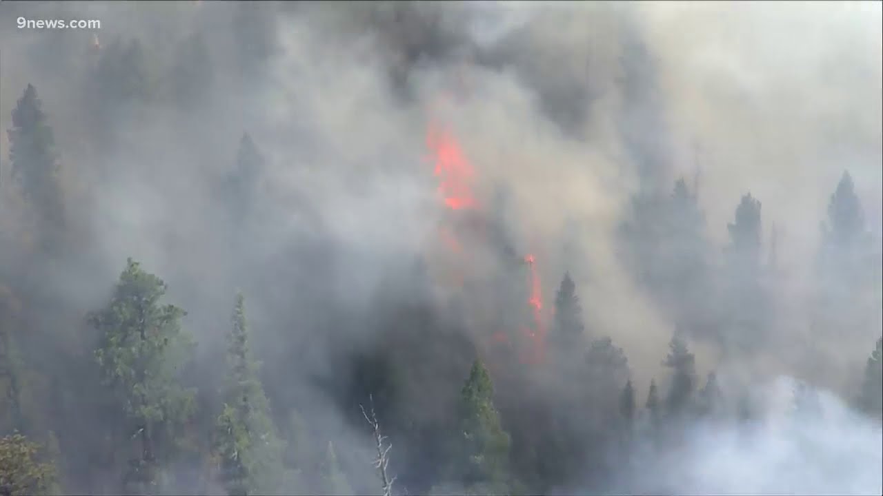 Wildfire burning near Evergreen - YouTube