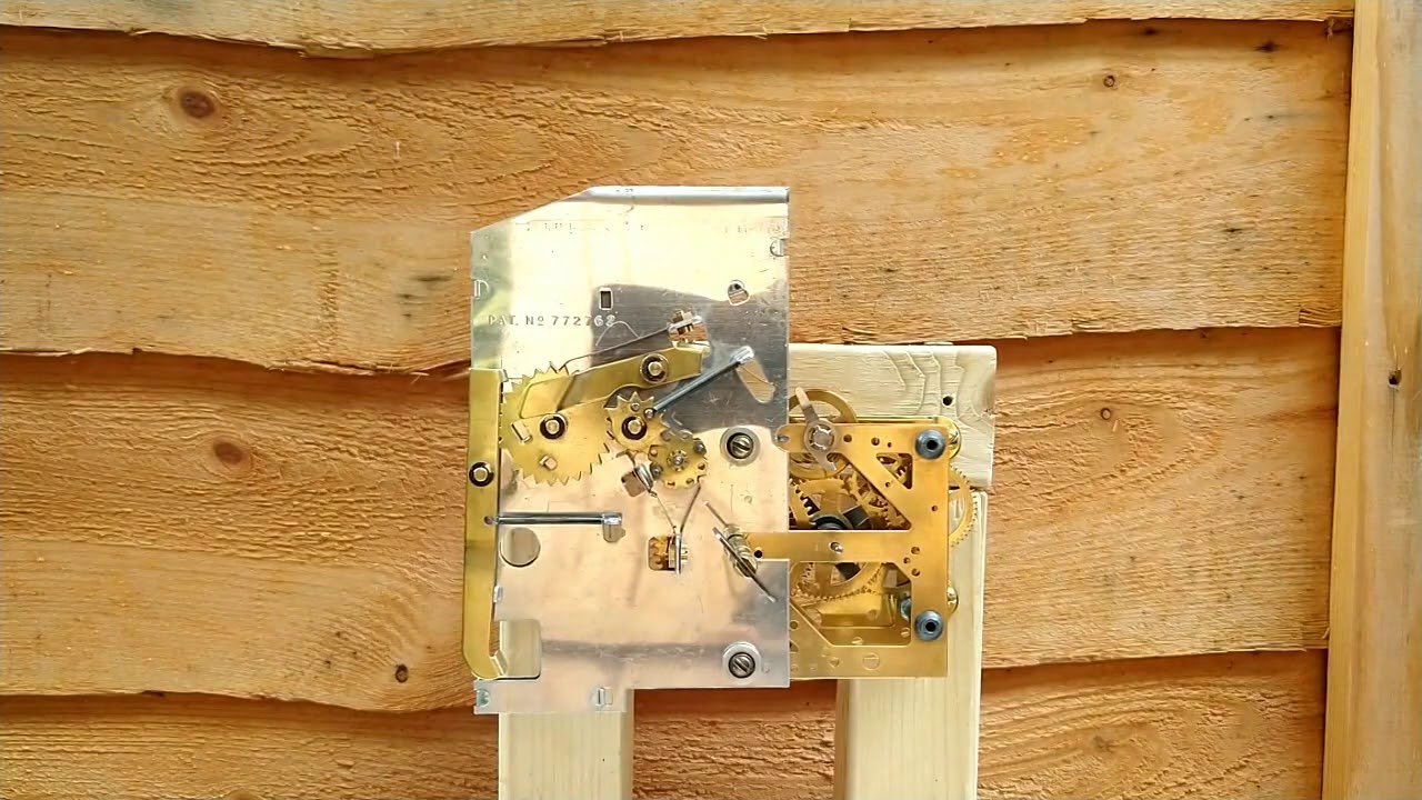 time savings clock - coin mechanism and clock movement together - YouTube