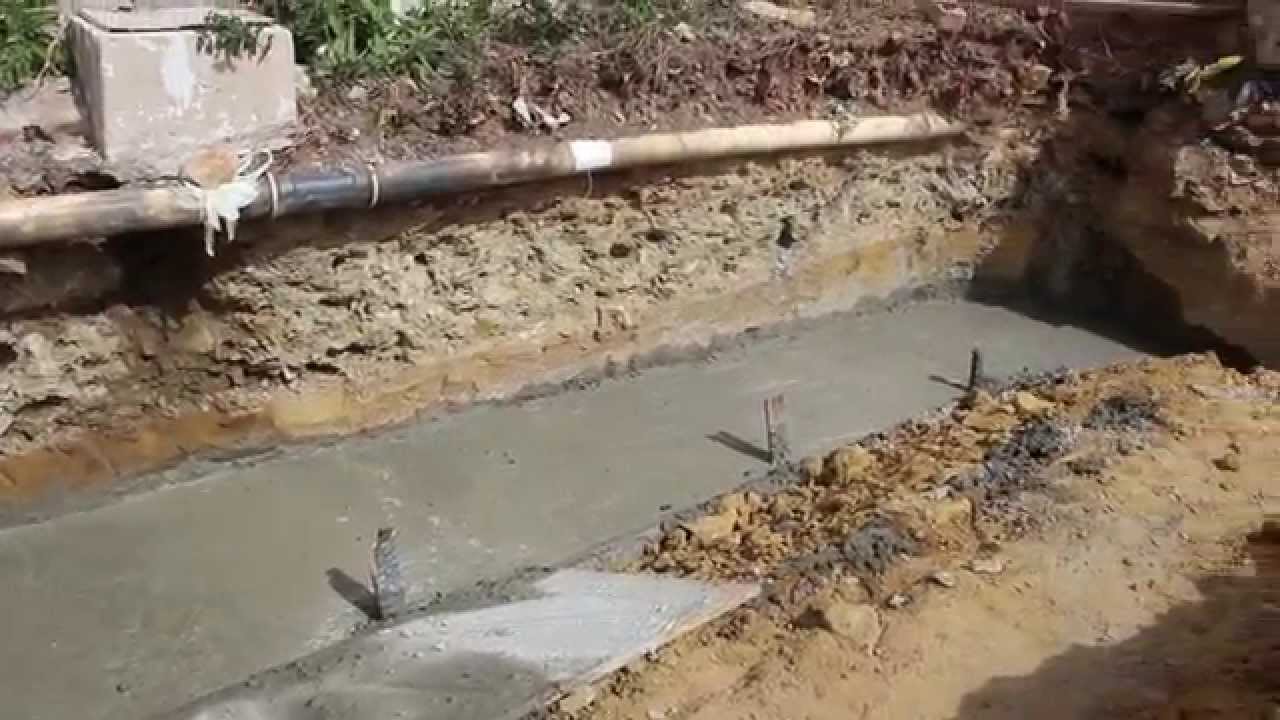 #Construction Site: Filling the trenches with concrete - YouTube