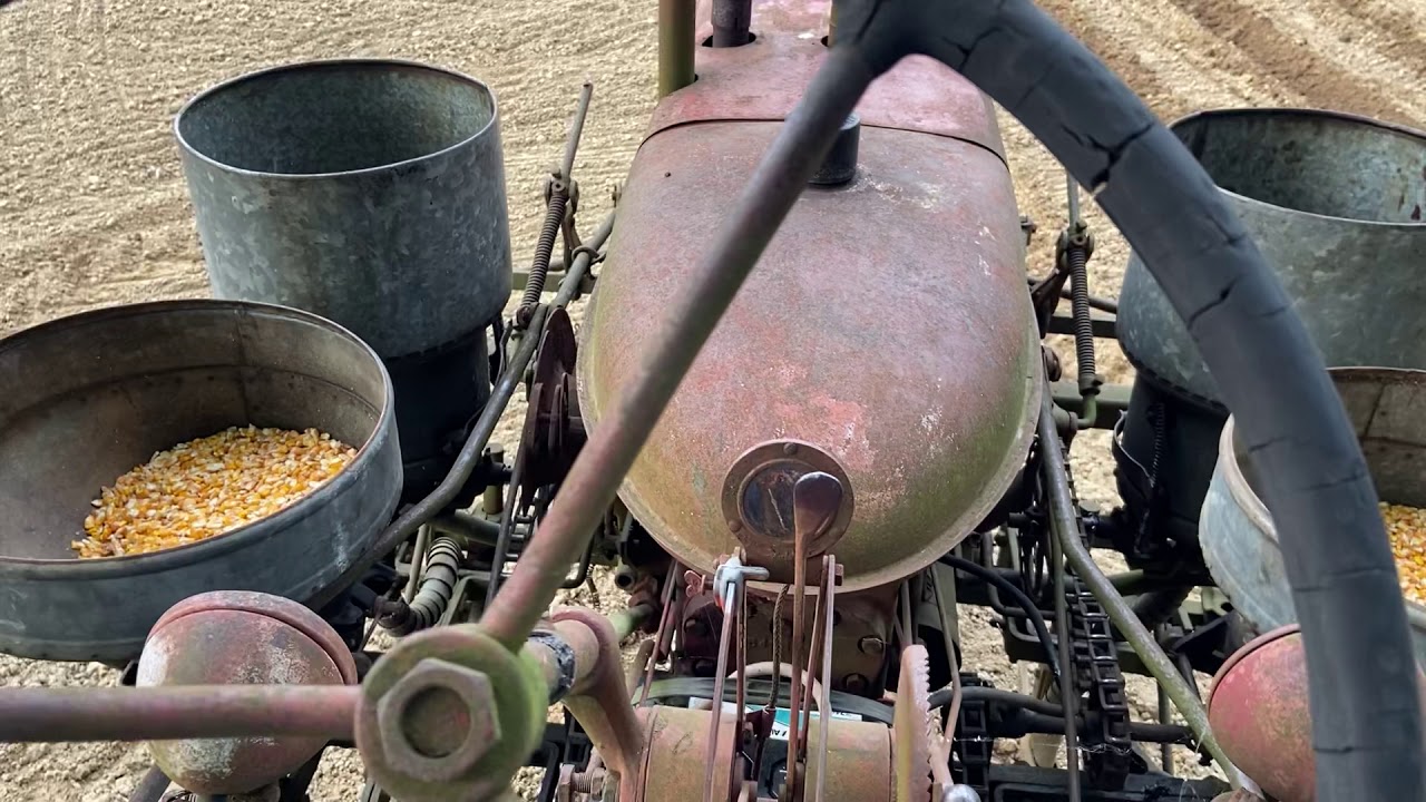 Farmall Super C planting yellow Jarvis corn - YouTube