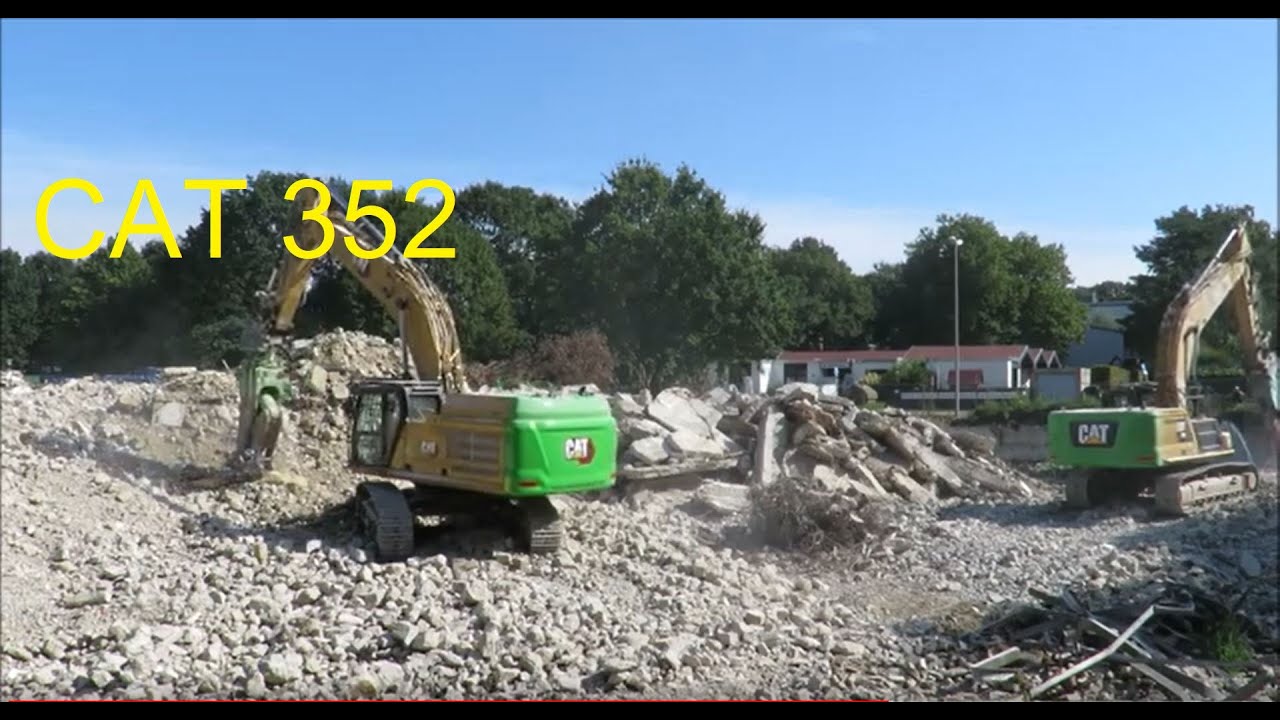 Excavator Cat 336 and CAT 352 -demolition site - YouTube