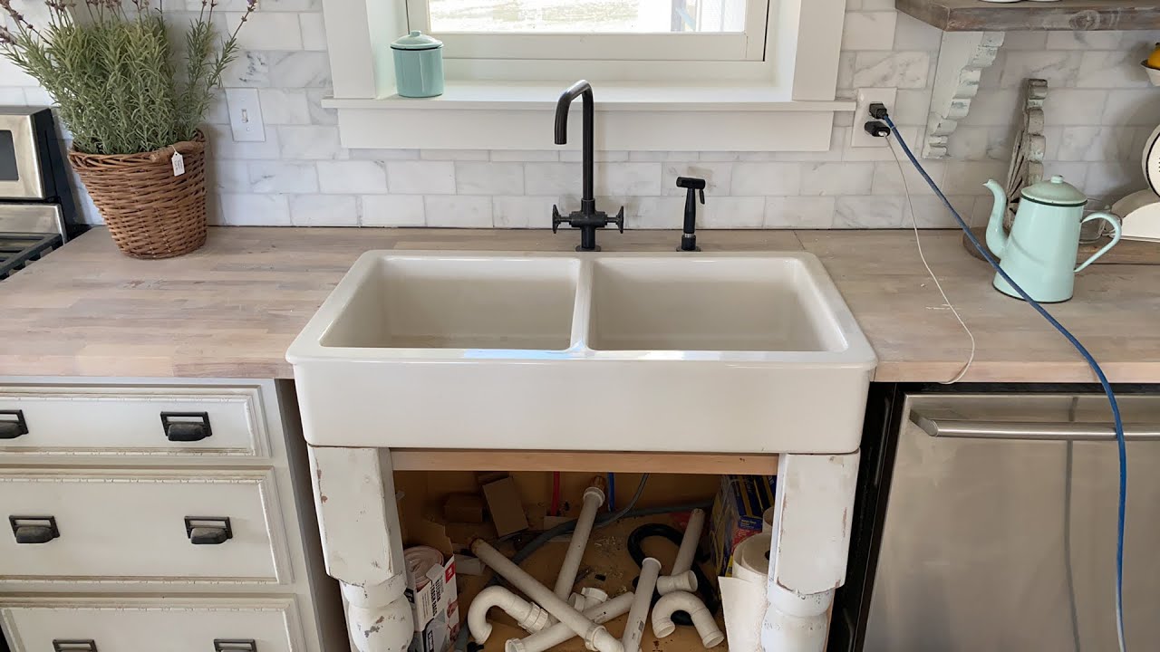 Kitchen Sink Plumbing and Cabinet Trim At The Farmhouse Remodel - YouTube