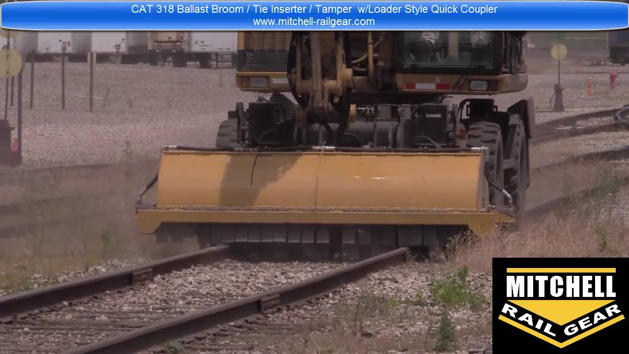 CAT M318 Ballast Reg Tamper Loader q hitch 1 Tutorial Video | Mitchell ...